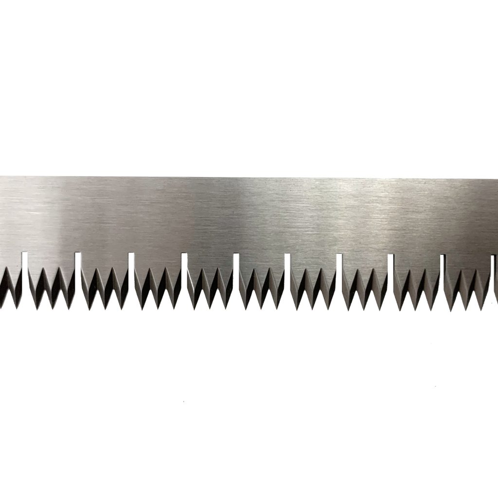 Custom shaped serrated knives for packaging industry