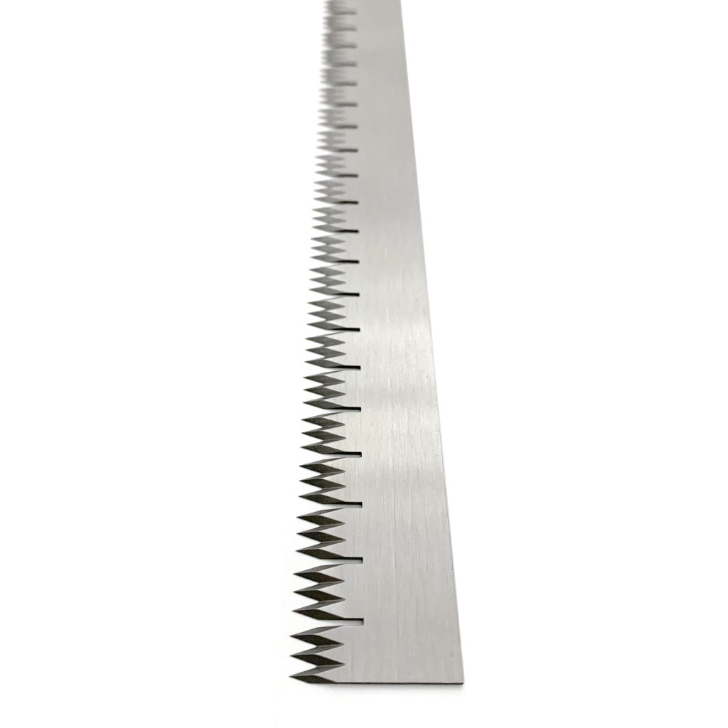 Custom shaped serrated knives for packaging industry